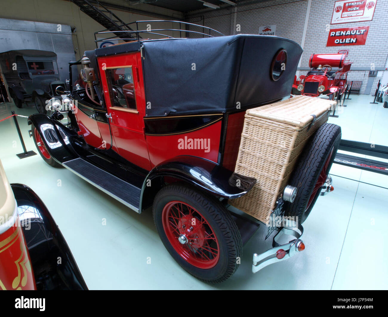 The 1928 Ford A Landaulette is a classic car that features a vintage ...