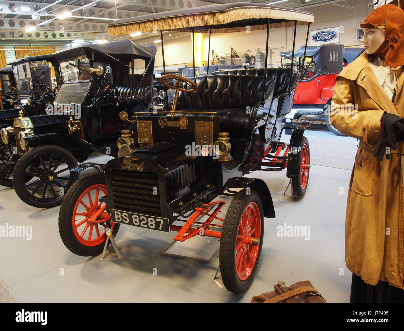 This is an image of a 1904 Ford C, a model from Ford's early automobile ...