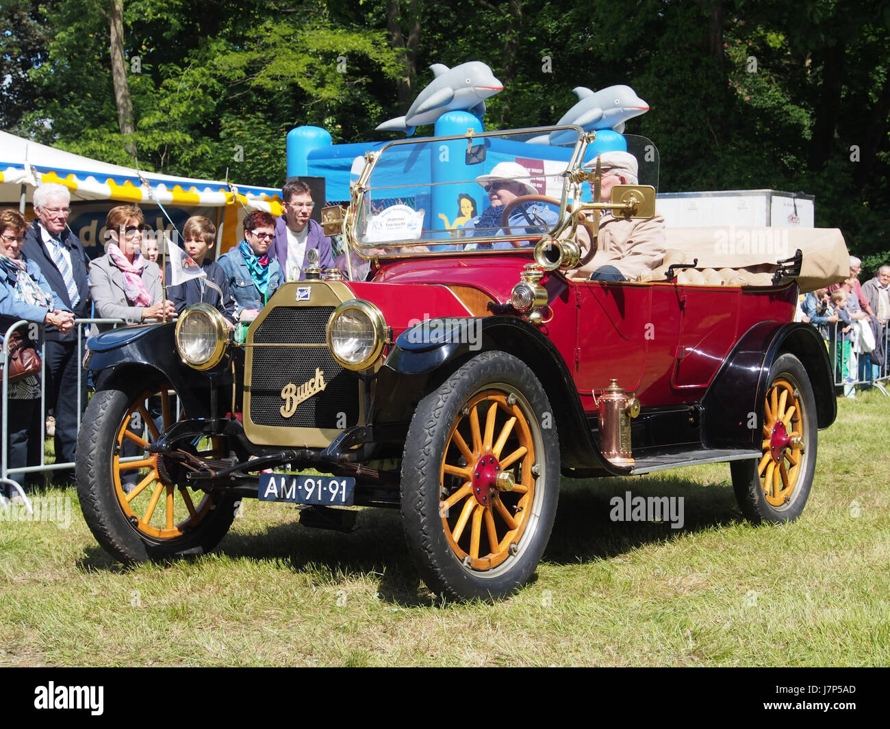 This image showcases the 1914 Buick B 35 Phaeton, a classic early 20th ...