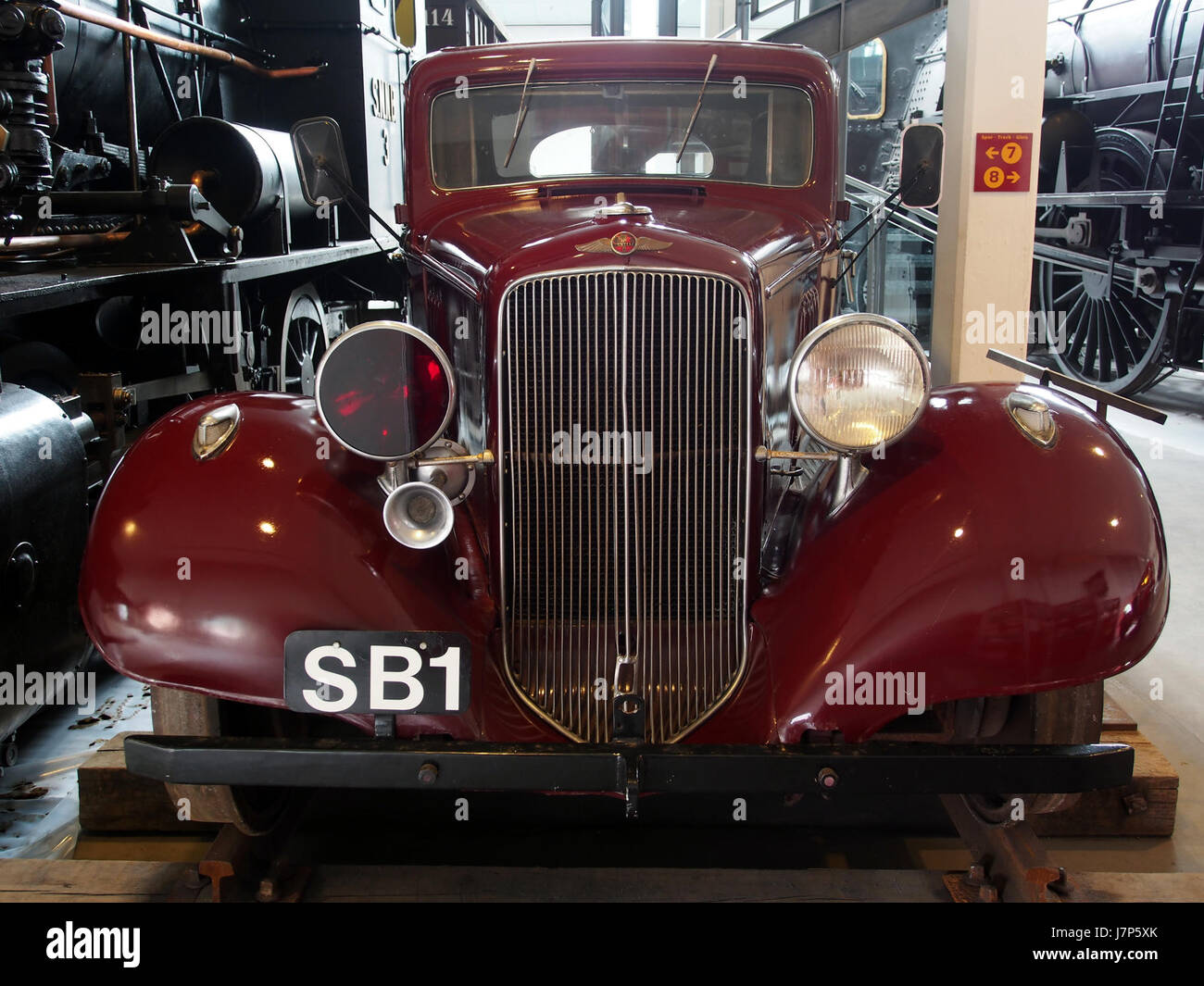 This image shows a 1933 Pontiac motor trolley, a vehicle model from the ...