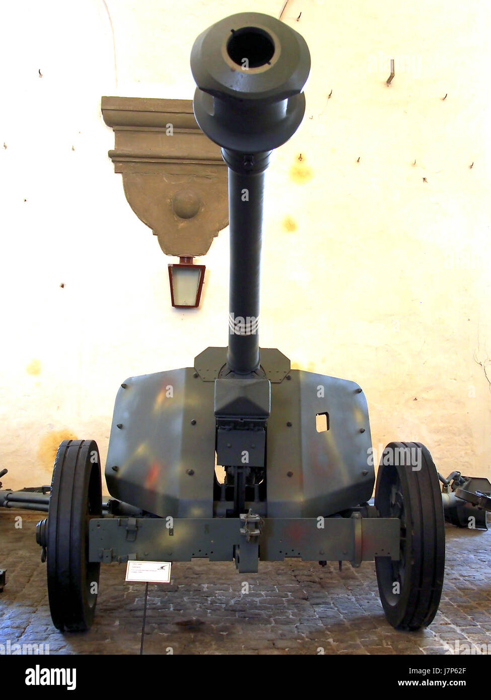 This image shows a 7.5 cm anti-tank cannon, a piece of artillery used ...