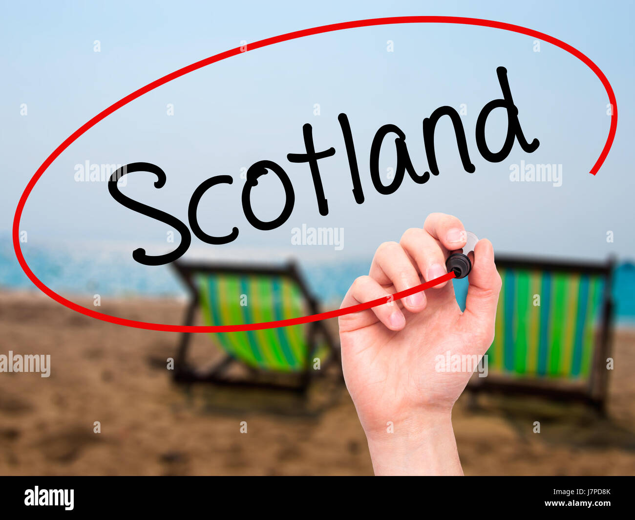Man Hand writing Scotland with black marker on visual screen. Isolated ...