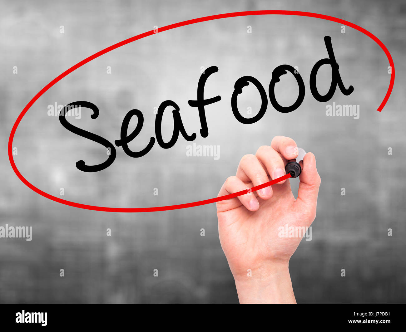 Man Hand writing Seafood with black marker on visual screen. Isolated ...