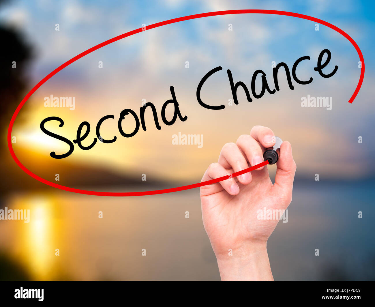 Man Hand writing Second Chance with black marker on visual screen ...