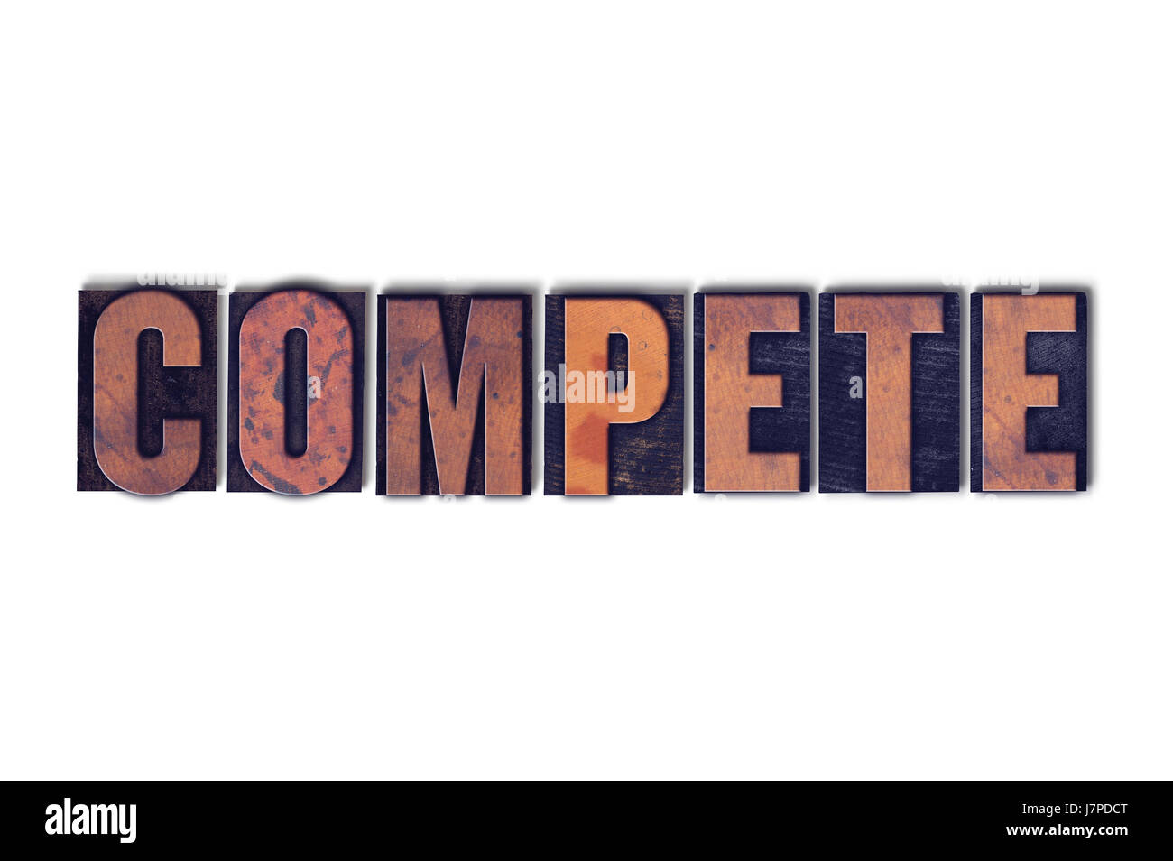 The word Compete concept and theme written in vintage wooden ...