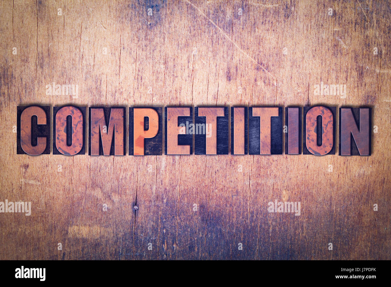 The word Competition concept and theme written in vintage wooden ...