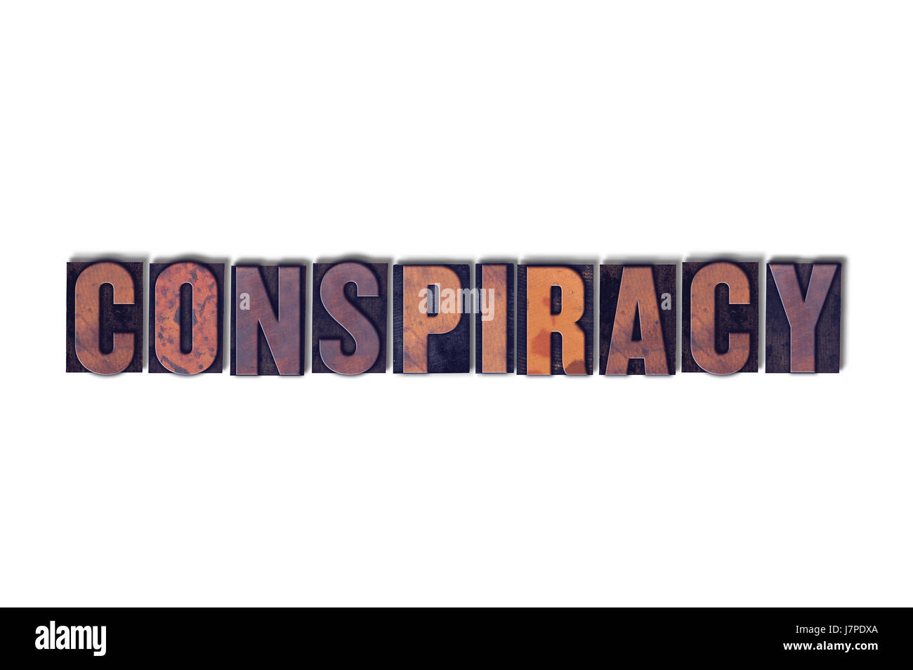 The word Conspiracy concept and theme written in vintage wooden ...