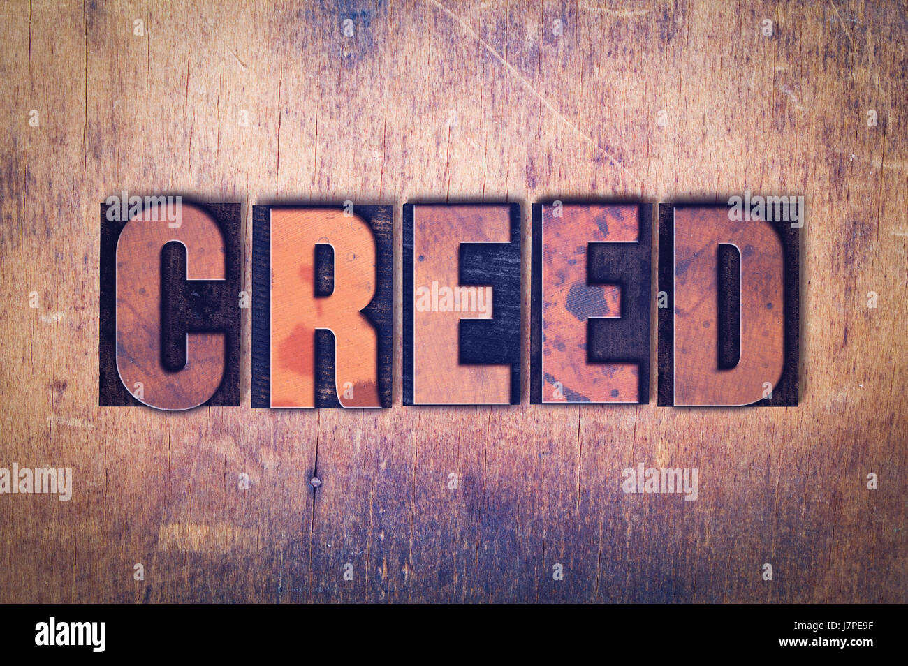 The word Creed concept and theme written in vintage wooden letterpress ...
