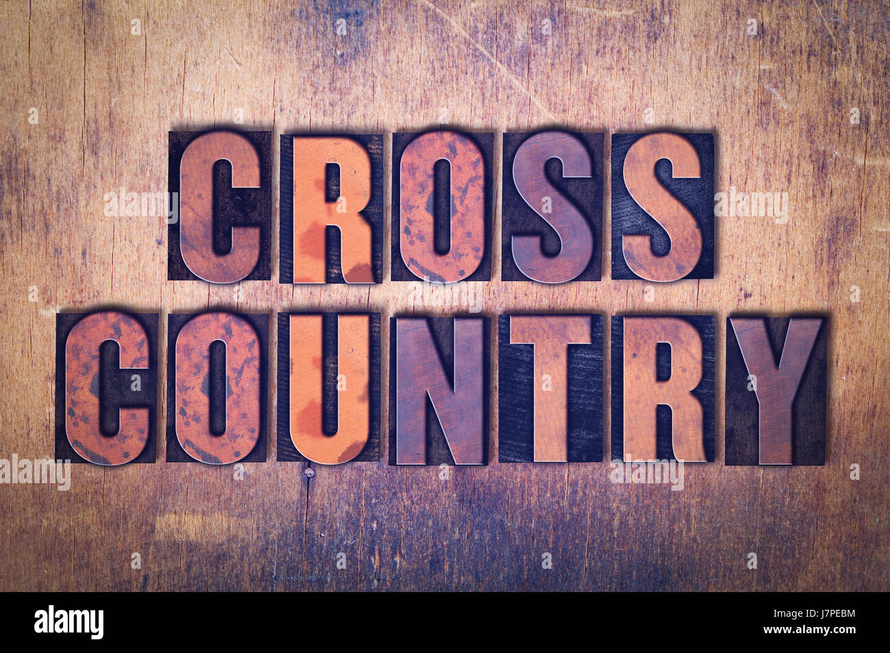 The words Cross Country concept and theme written in vintage wooden ...