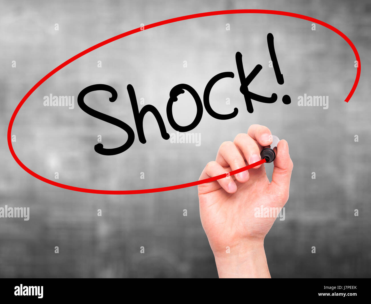 Man Hand writing Shock! with black marker on visual screen. Isolated on ...