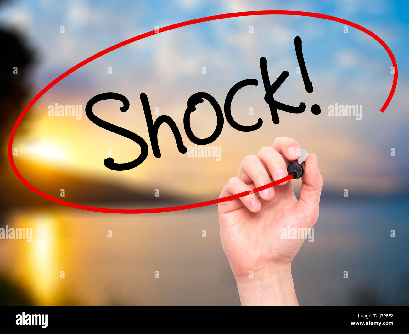 Man Hand writing Shock! with black marker on visual screen. Isolated on ...