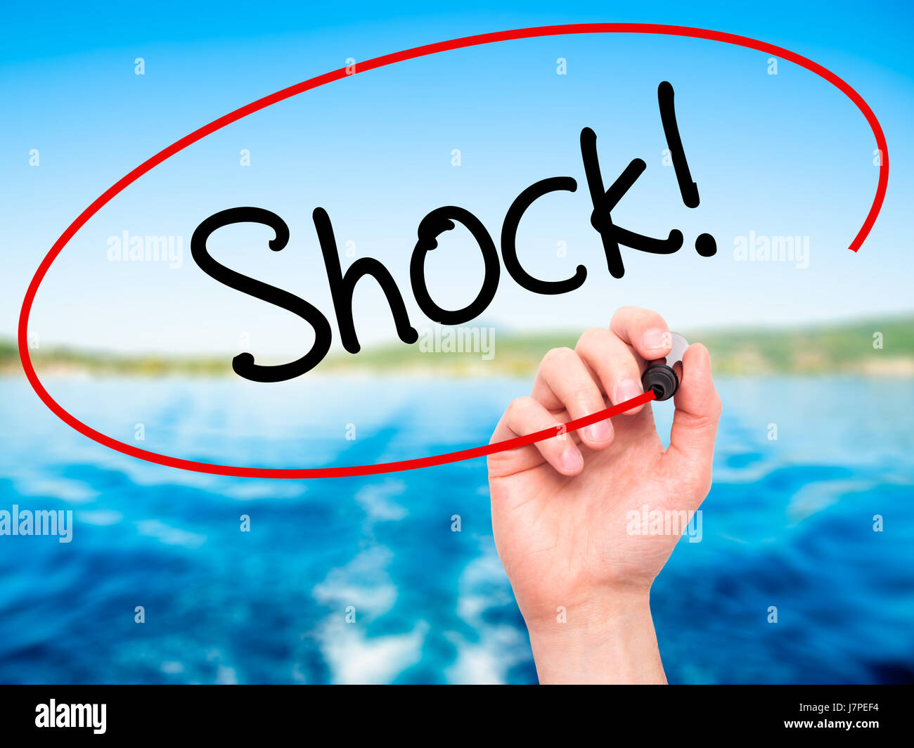 Man Hand writing Shock! with black marker on visual screen. Isolated on ...