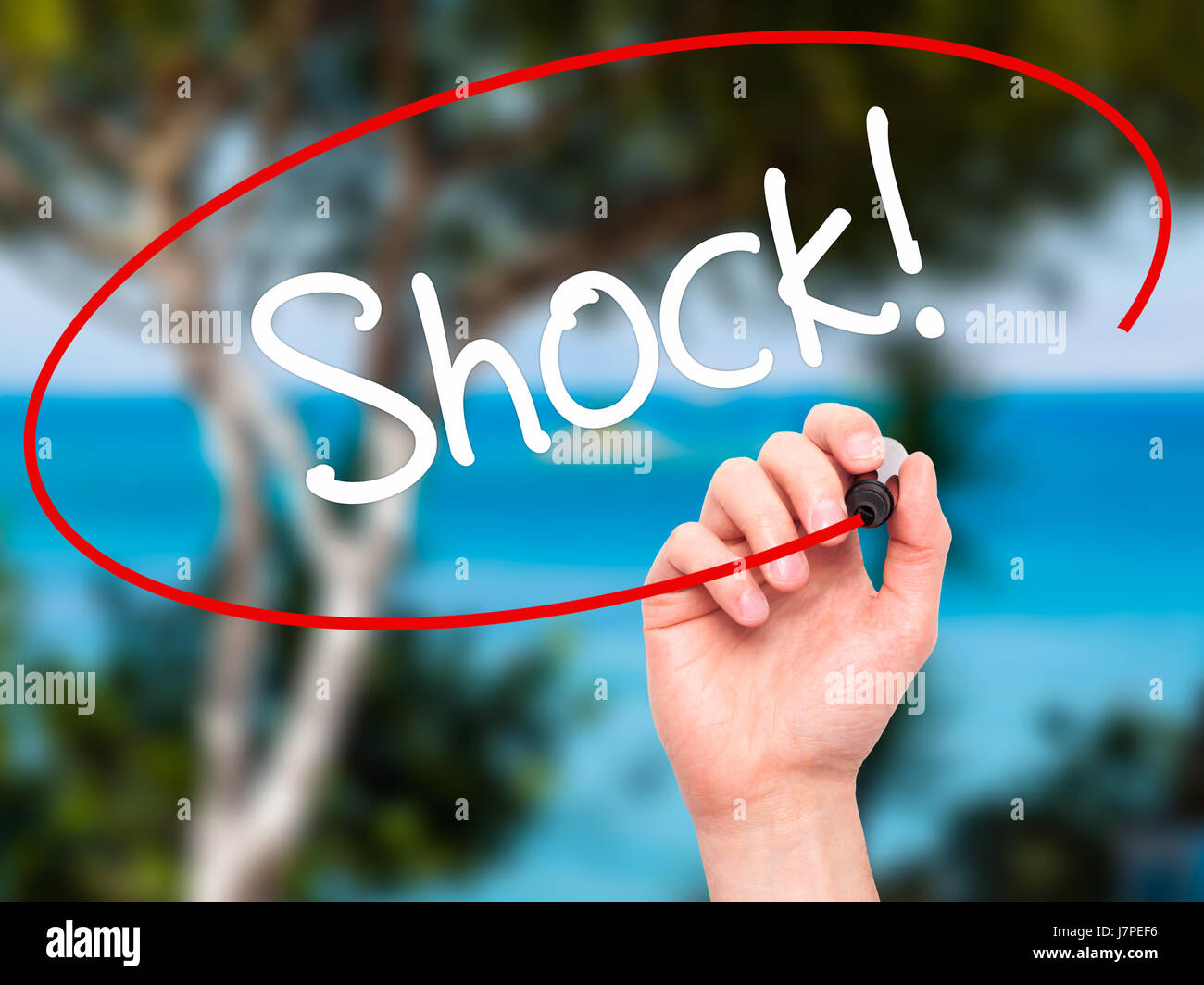 Man Hand writing Shock! with black marker on visual screen. Isolated on ...