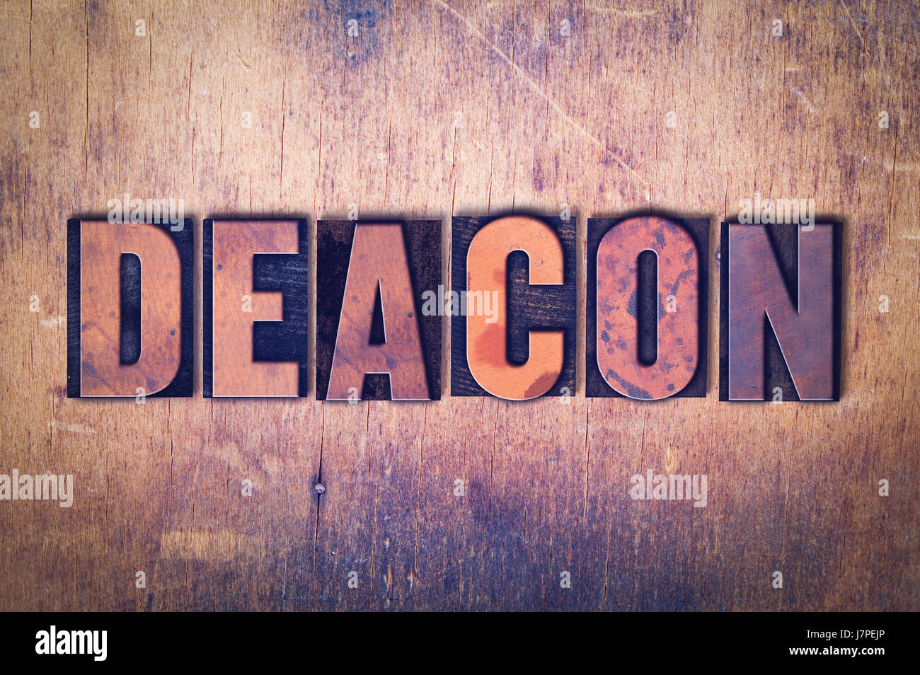 The word Deacon concept and theme written in vintage wooden letterpress ...
