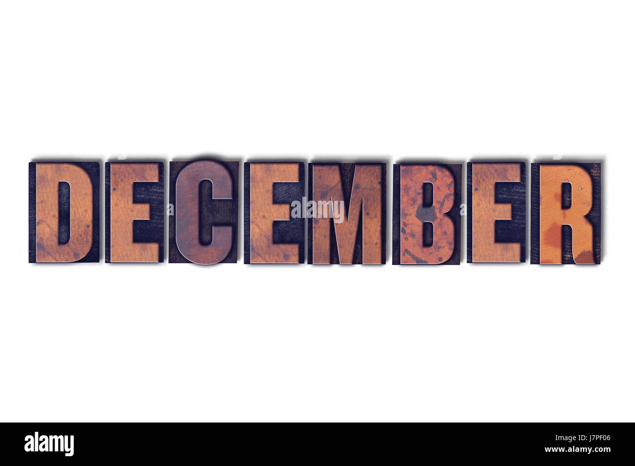 The word December concept and theme written in vintage wooden ...
