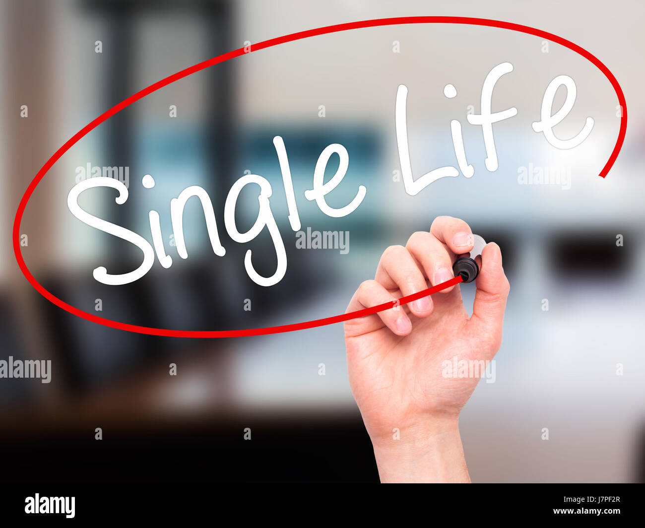 Man Hand writing Single Life with black marker on visual screen ...