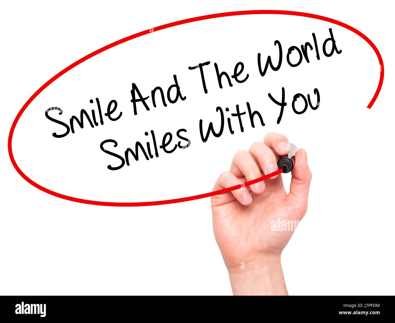 Man Hand writing Smile And The World Smiles To You with black marker on ...