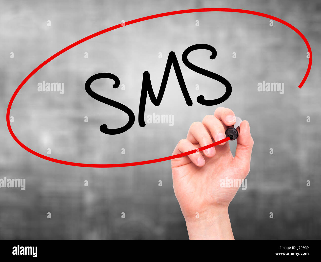 Man Hand writing SMS (Short Message Service) with black marker on ...