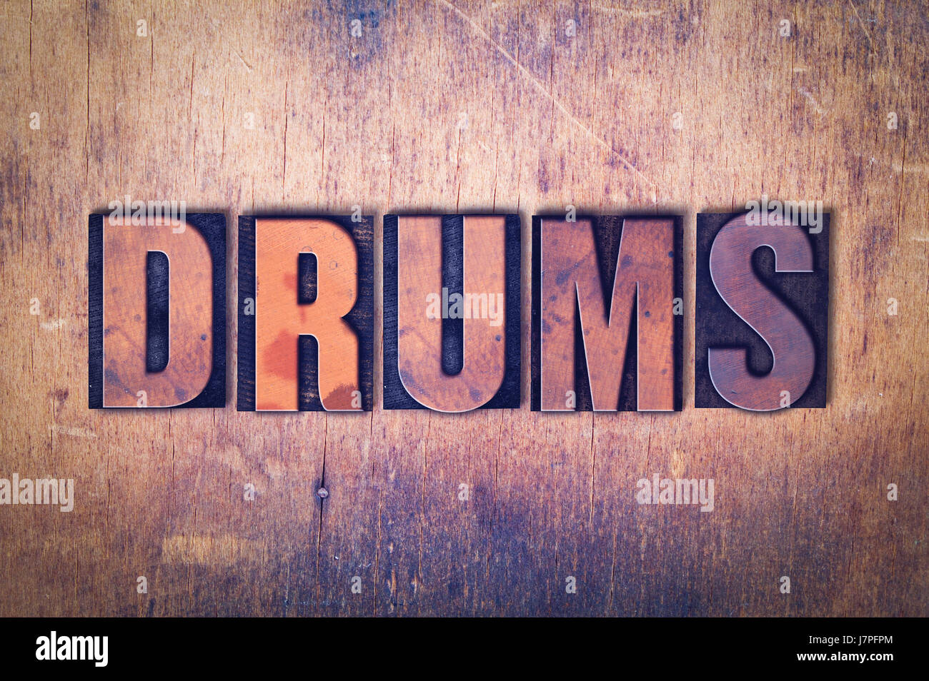 The word Drums concept and theme written in vintage wooden letterpress ...