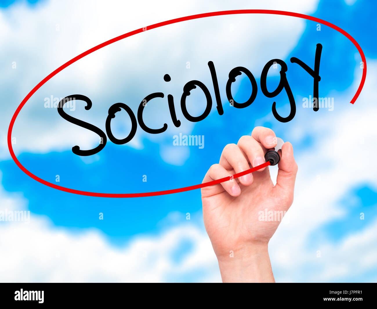 Man Hand writing Sociology with black marker on visual screen. Isolated ...