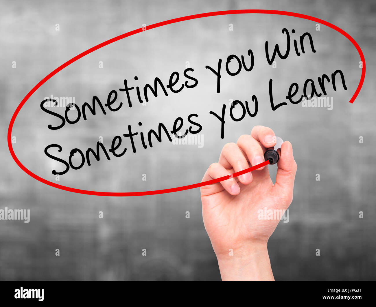 Man Hand writing Sometimes you Win Sometimes you Learn with black ...