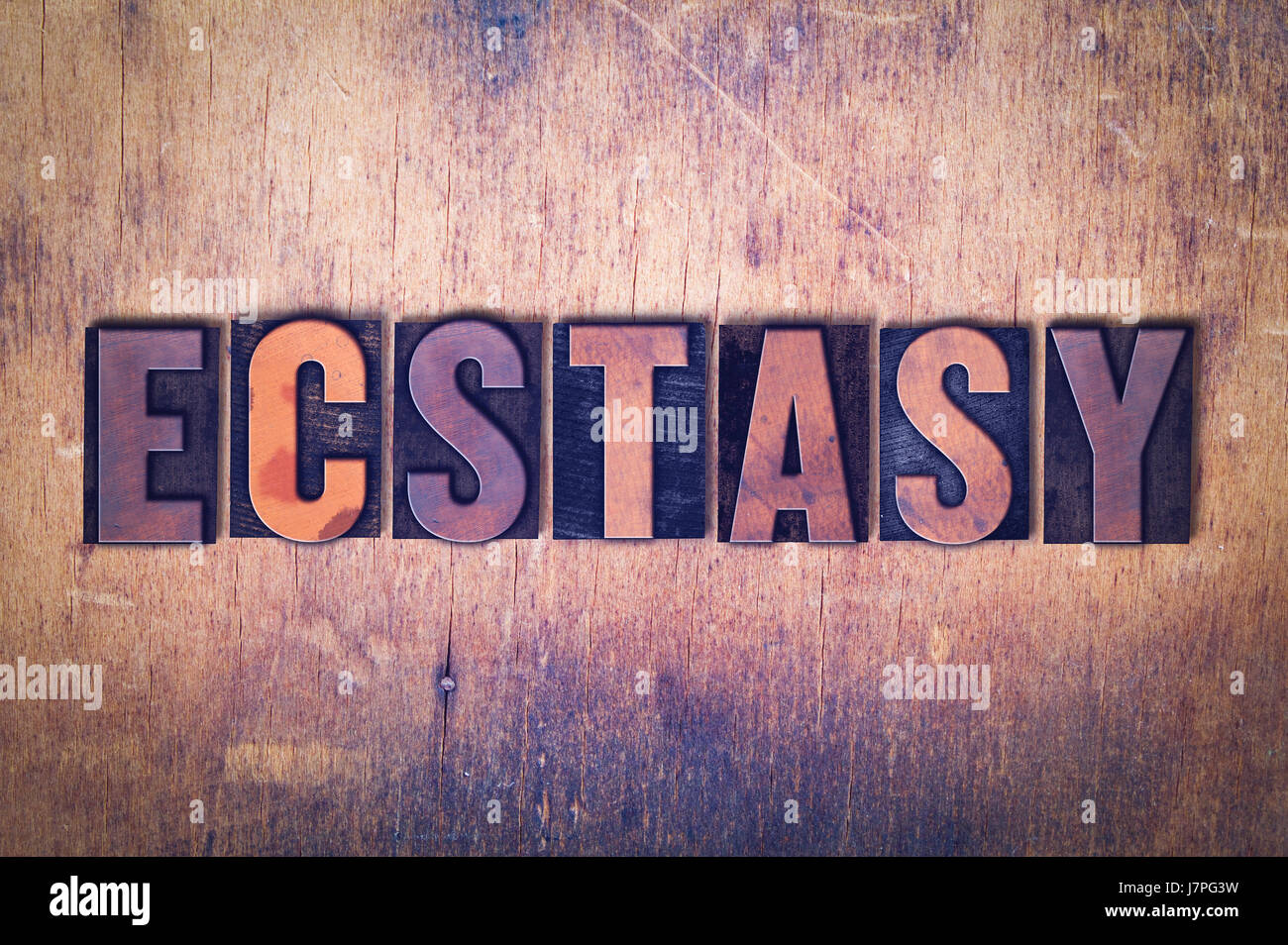 The word Ecstasy concept and theme written in vintage wooden ...