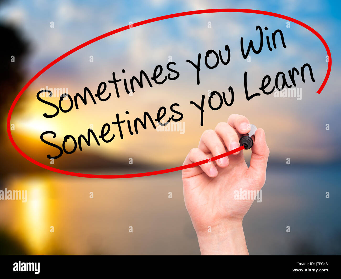 Man Hand writing Sometimes you Win Sometimes you Learn with black ...