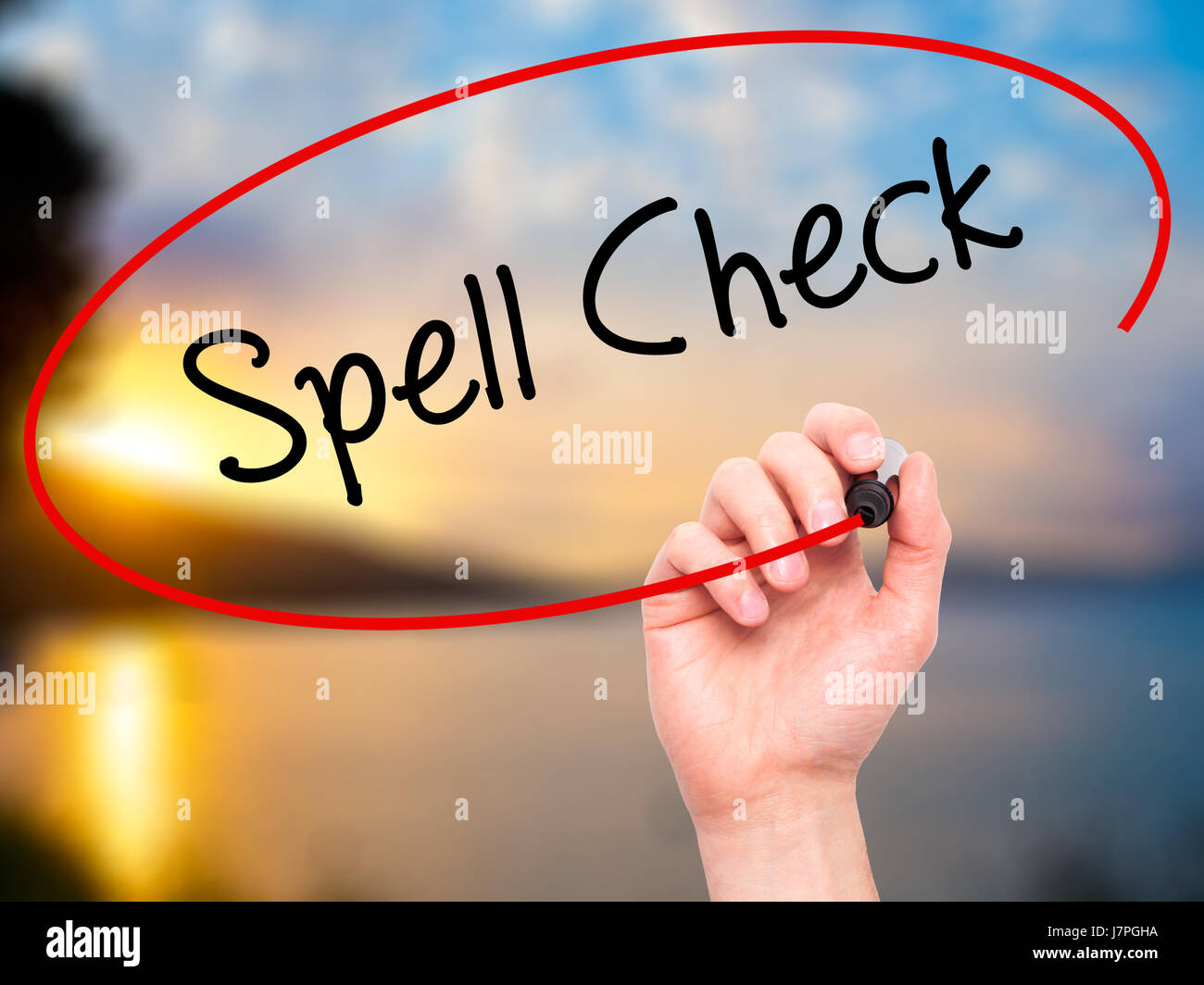 Man Hand writing Spell Check with black marker on visual screen ...