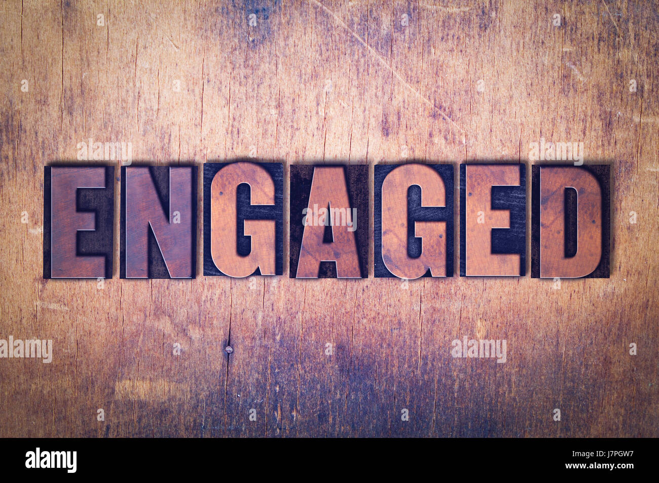 The word Engaged concept and theme written in vintage wooden ...