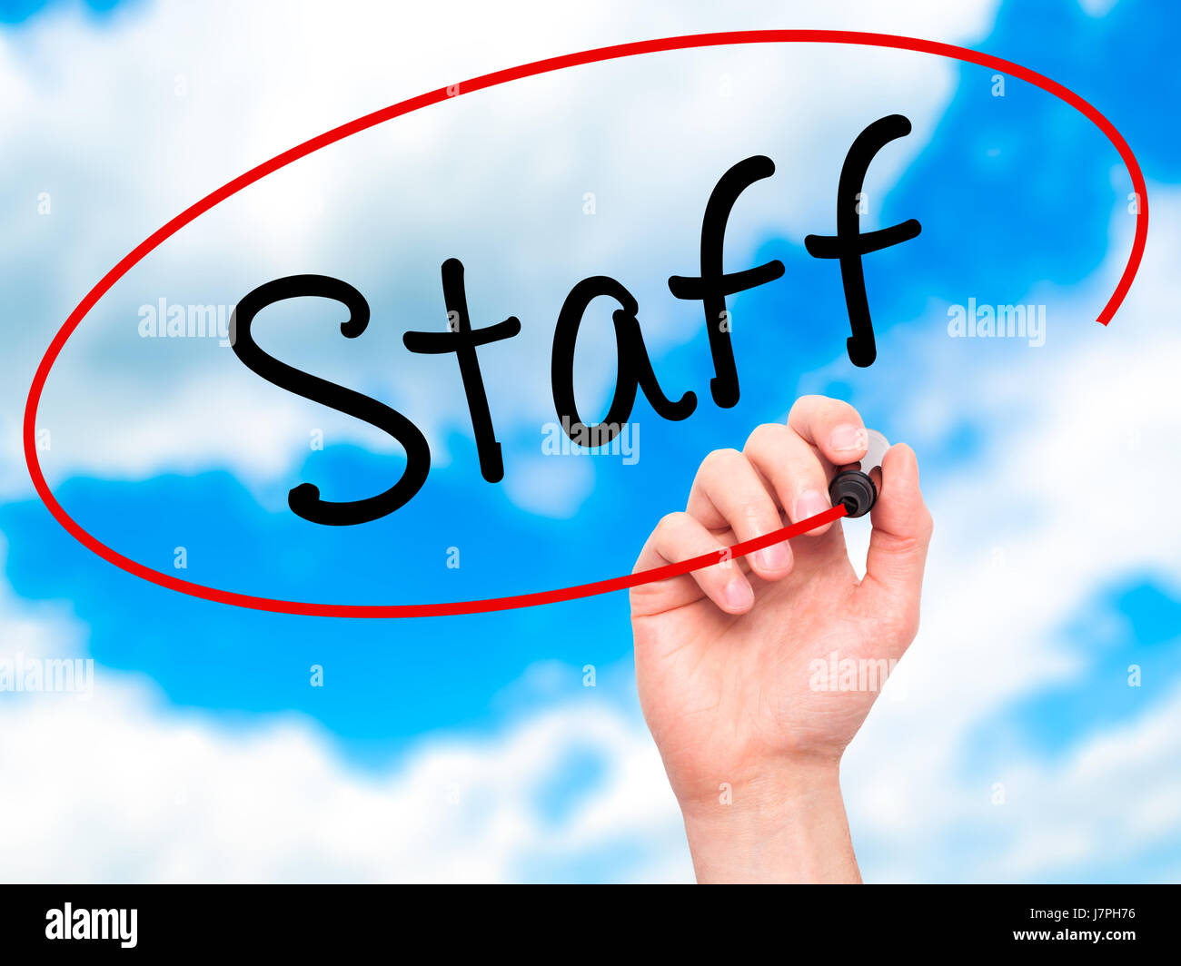 Man Hand writing Staff with black marker on visual screen. Isolated on ...