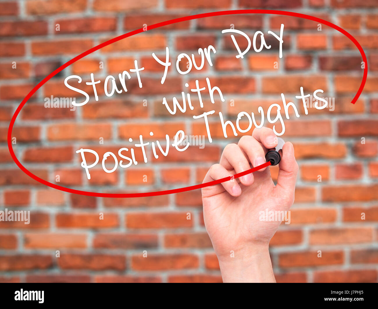 Man Hand writing Start your Dat with Positive Thoughts with black ...