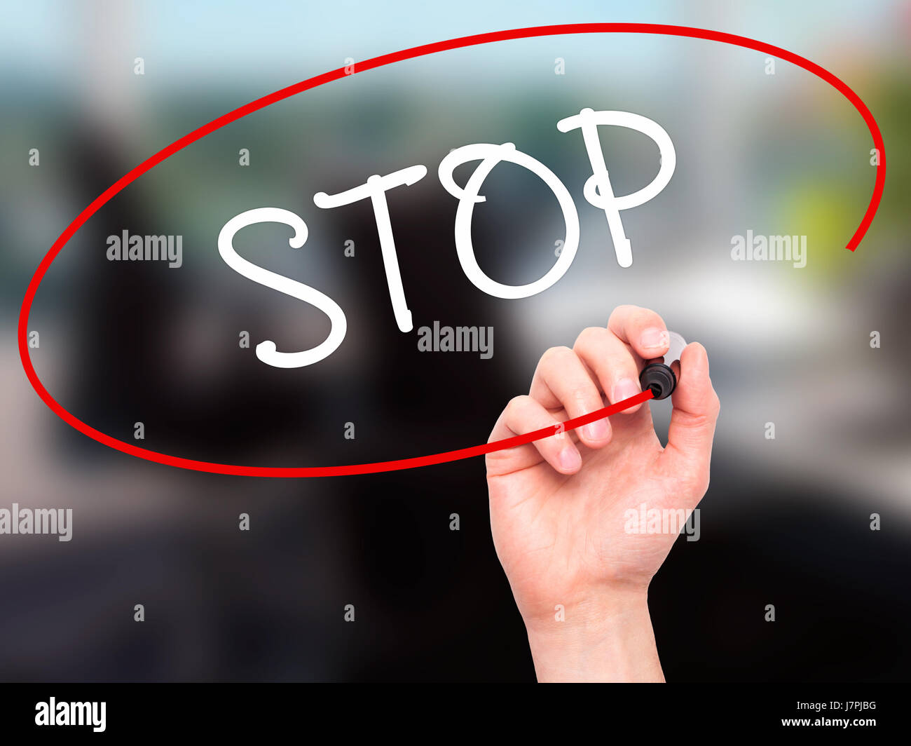 Man Hand writing STOP with black marker on visual screen. Isolated on ...
