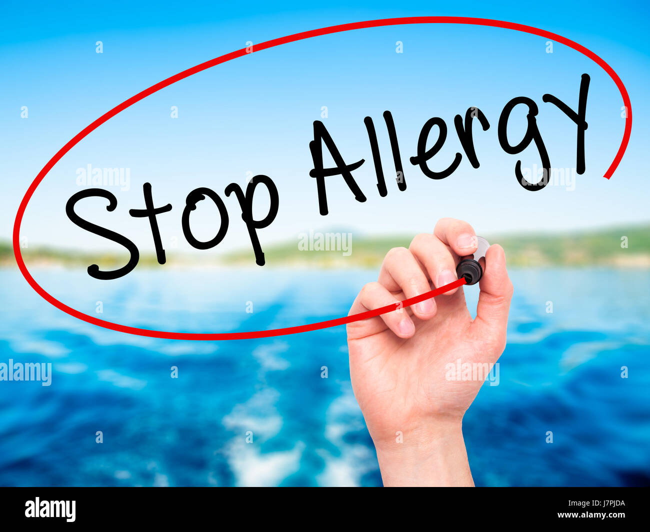 Man Hand writing Stop Allergy with black marker on visual screen ...