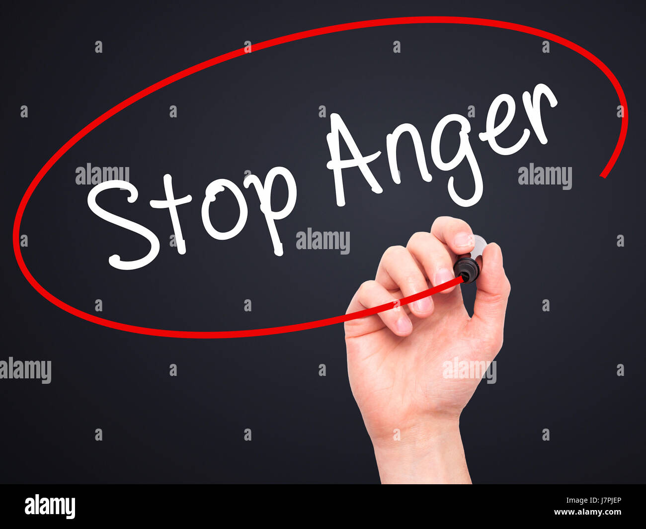 Man Hand writing Stop Anger with black marker on visual screen ...