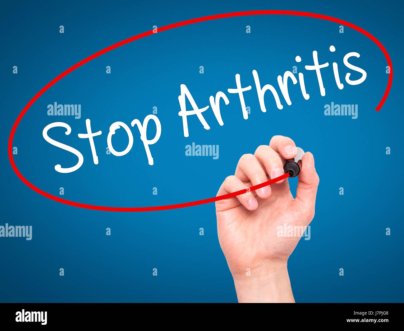 Man Hand writing Stop Arthritis with black marker on visual screen ...