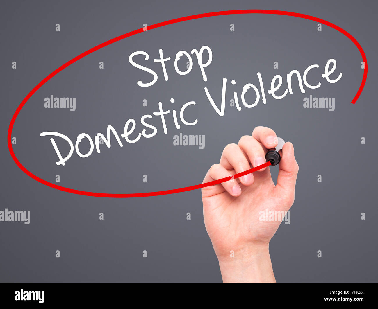 Man Hand writing Stop Domestic Violence with black marker on visual ...