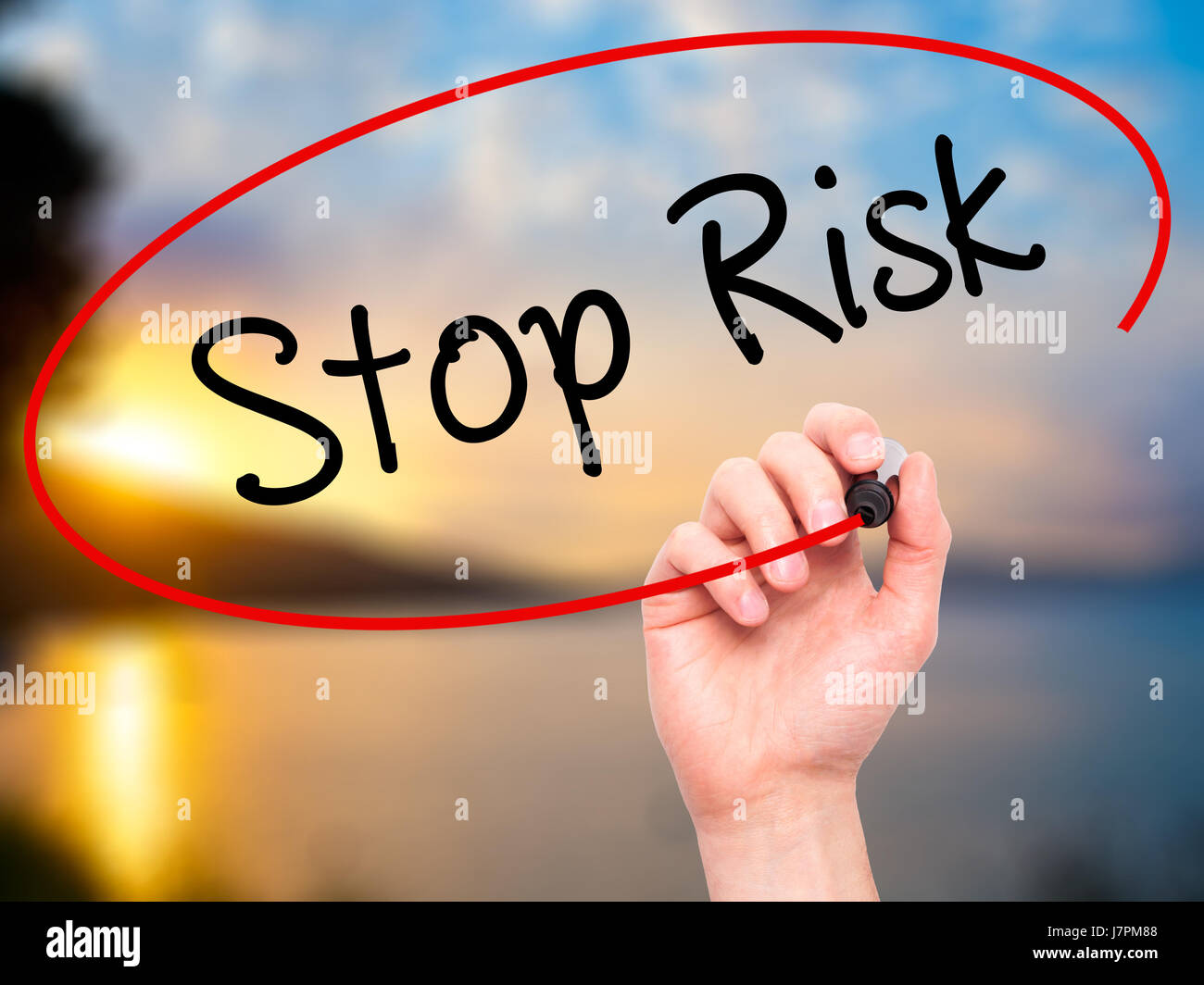 Man Hand writing Stop Risk with black marker on visual screen. Isolated ...