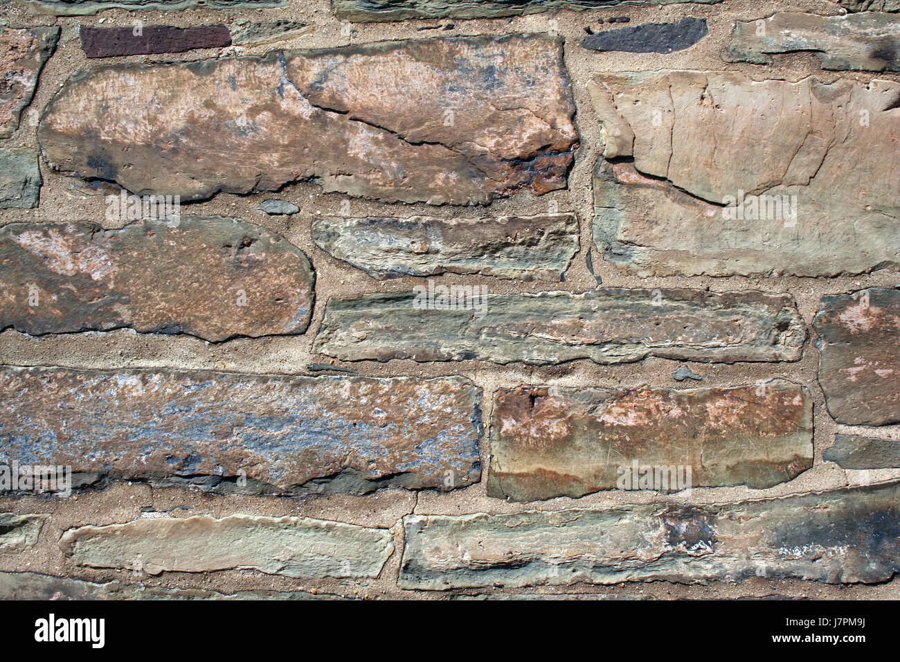 stone rough rock wall brick hard masonry style of construction ...