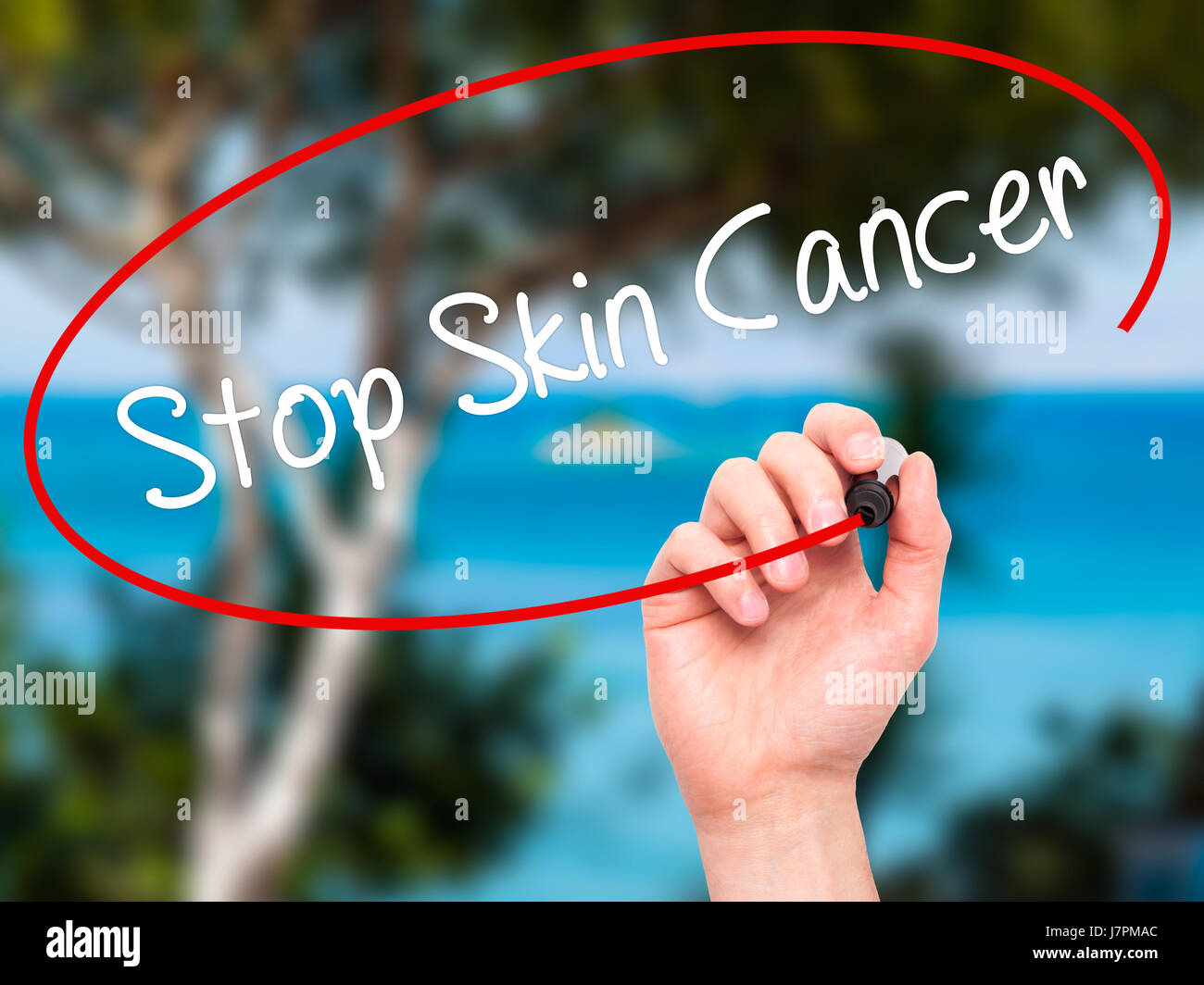 Man Hand writing Stop Skin Cancer with black marker on visual screen ...