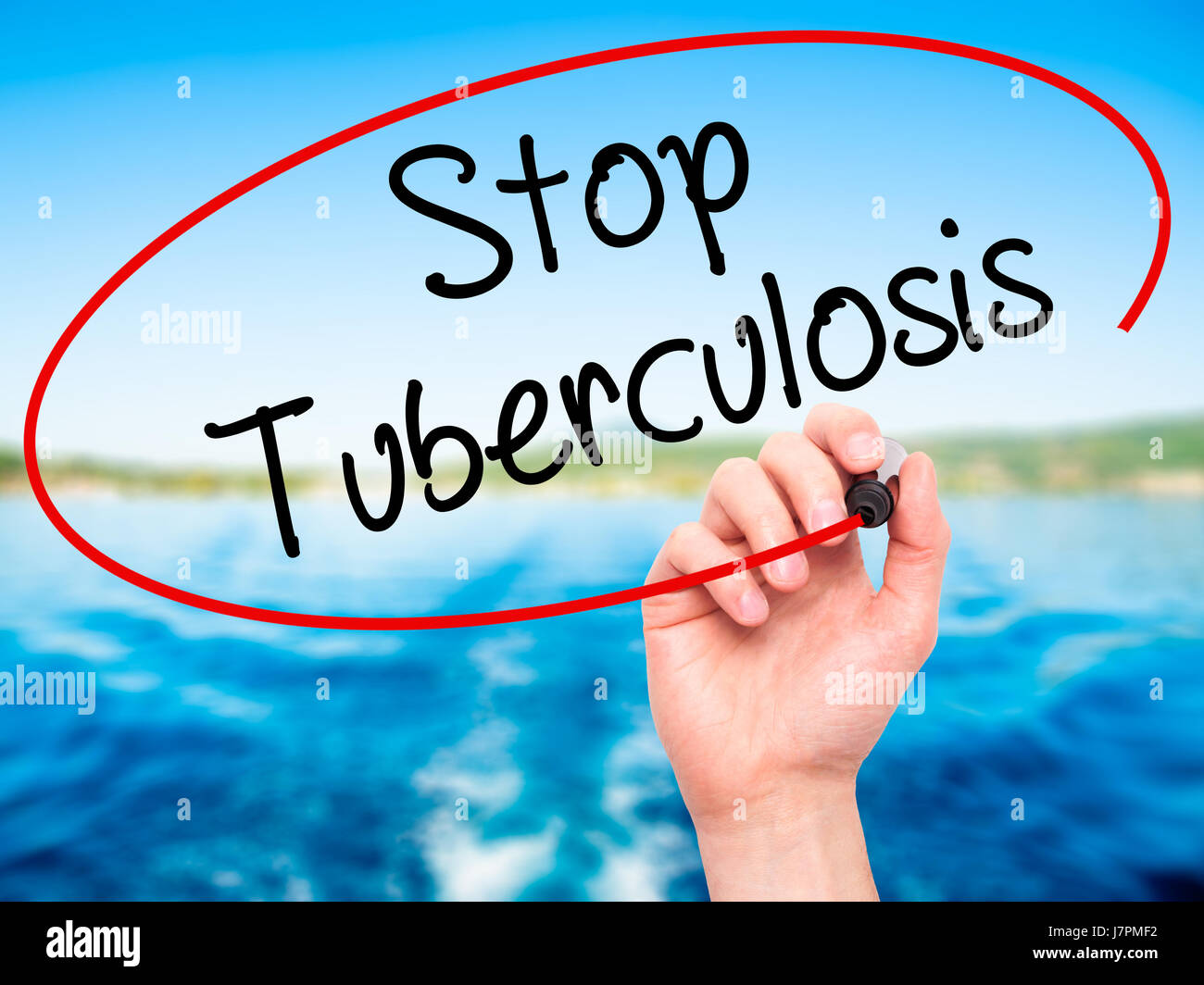 Man Hand writing Stop Tuberculosis with black marker on visual screen ...