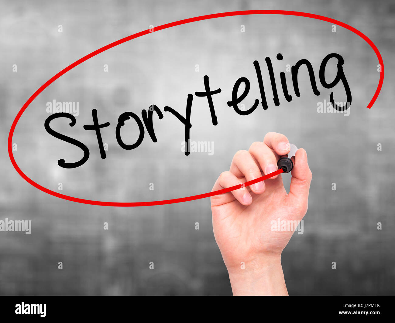 Man Hand writing Storytelling with black marker on visual screen ...