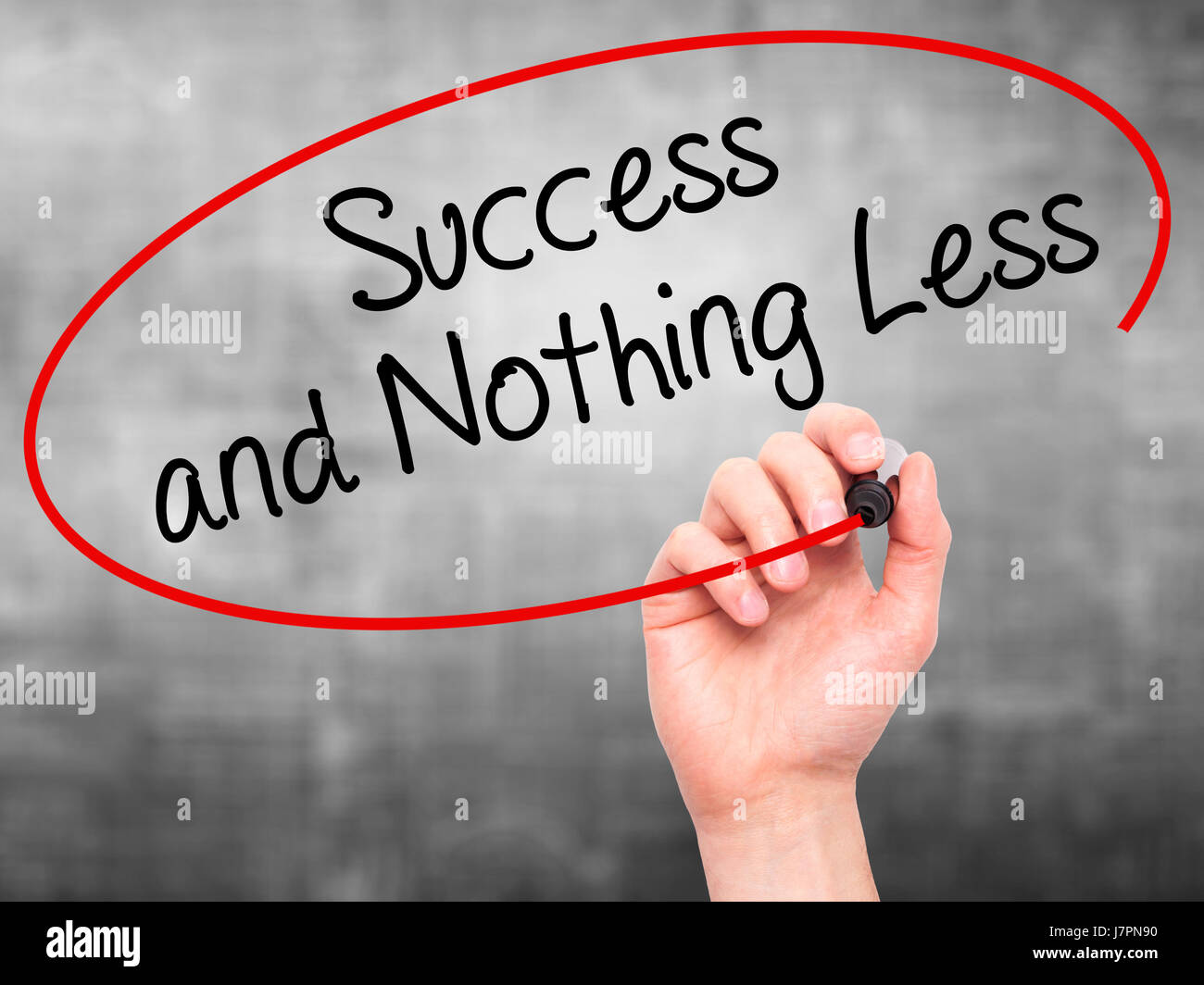 Man Hand writing Success and Nothing Less with black marker on visual ...