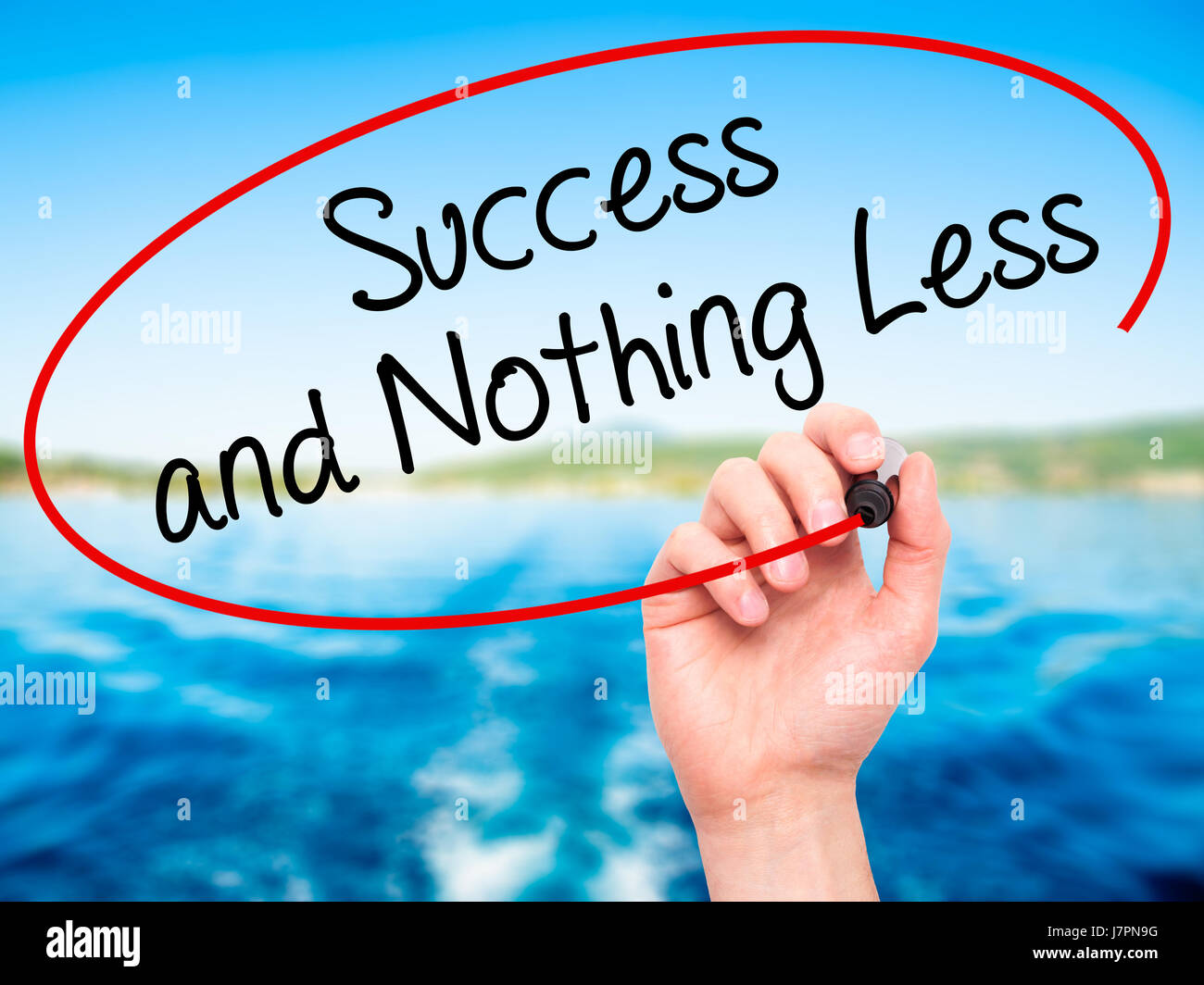 Man Hand writing Success and Nothing Less with black marker on visual ...