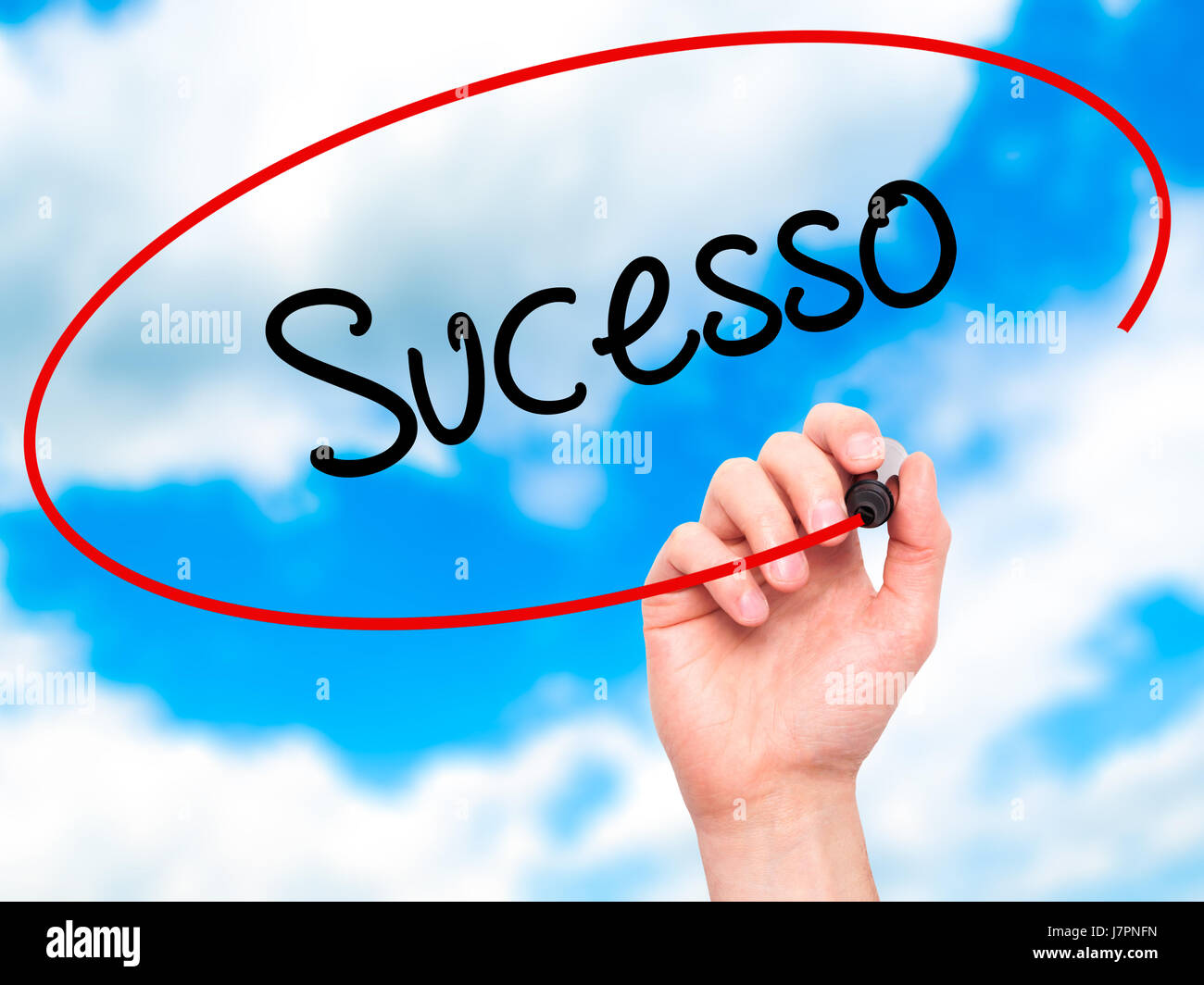 Man Hand writing Sucesso (Success in Portuguese) with black marker on ...