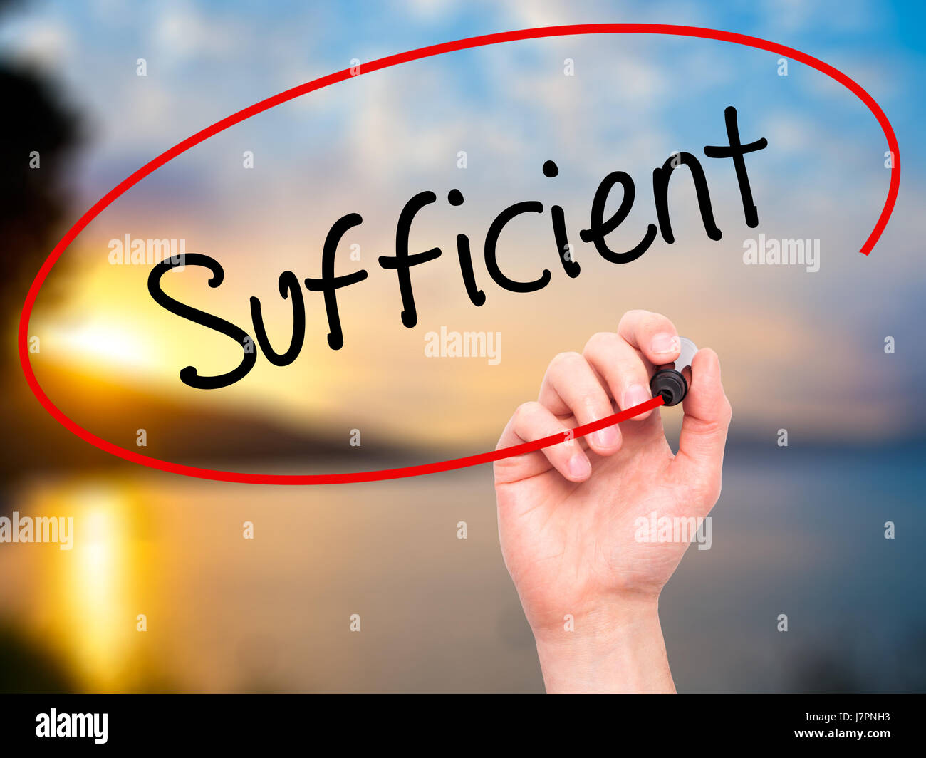 Man Hand writing Sufficient with black marker on visual screen ...