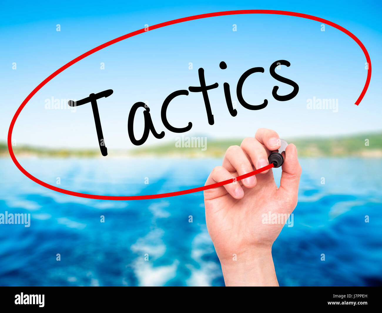 Man Hand writing Tactics with black marker on visual screen. Isolated ...