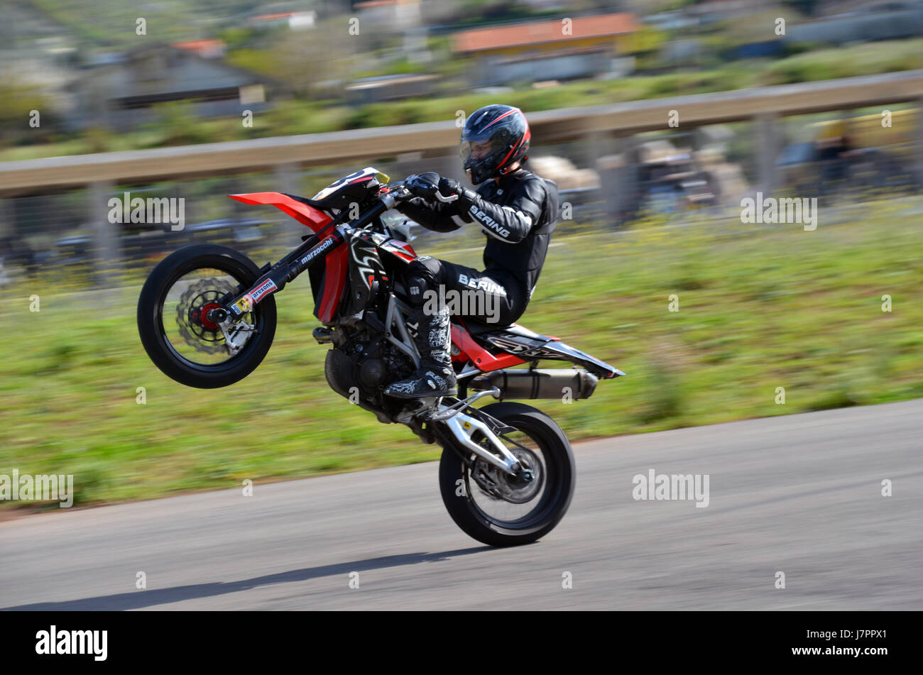 Wheelie with the motorcycle Stock Photo - Alamy