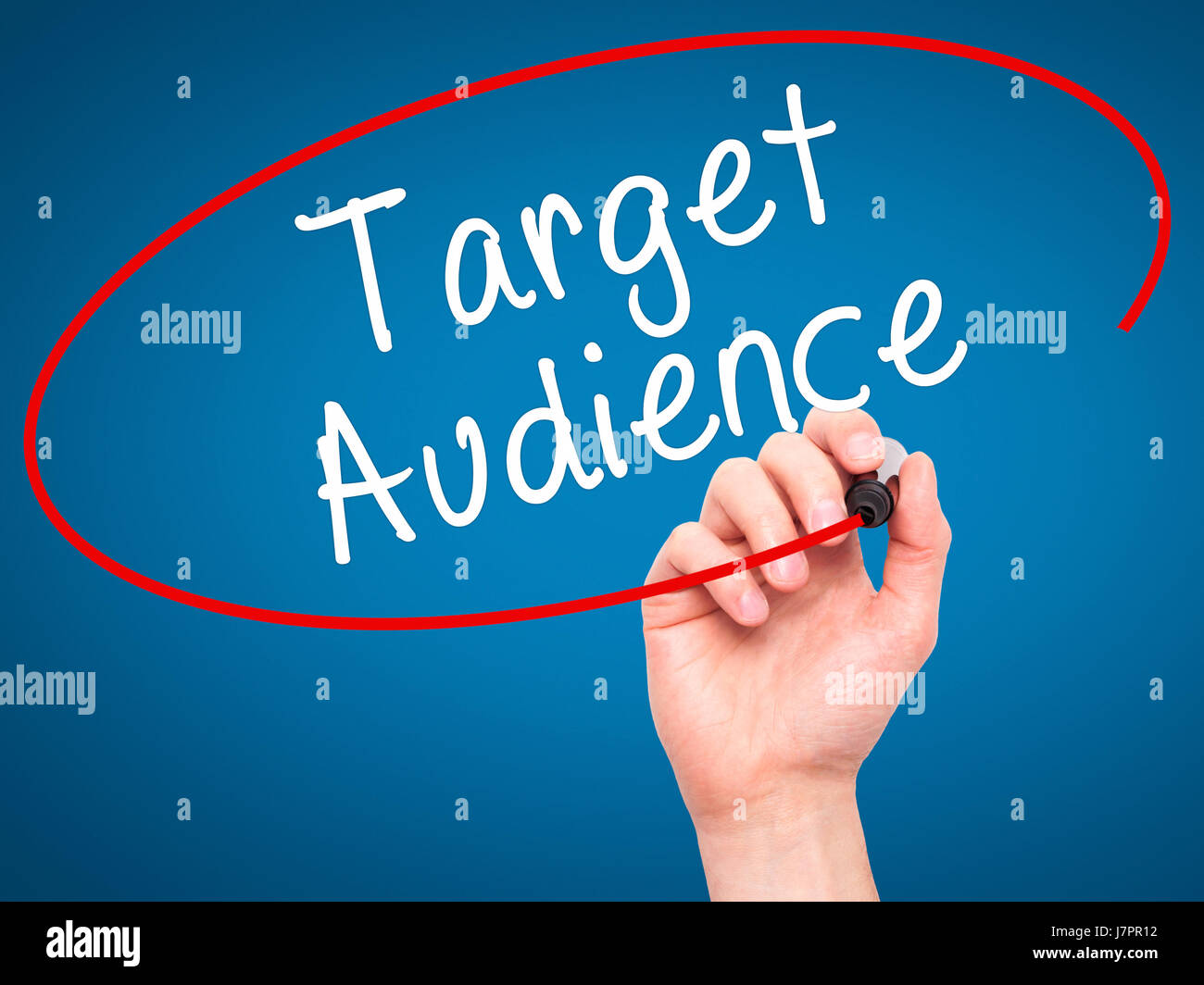 Man Hand writing Target Audience with black marker on visual screen ...