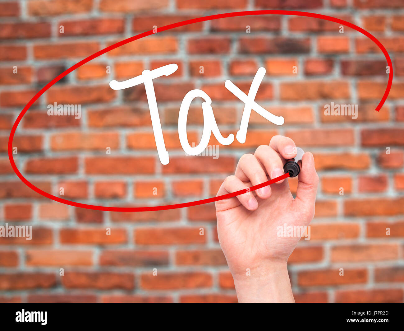 Man Hand writing Tax with black marker on visual screen. Isolated on ...