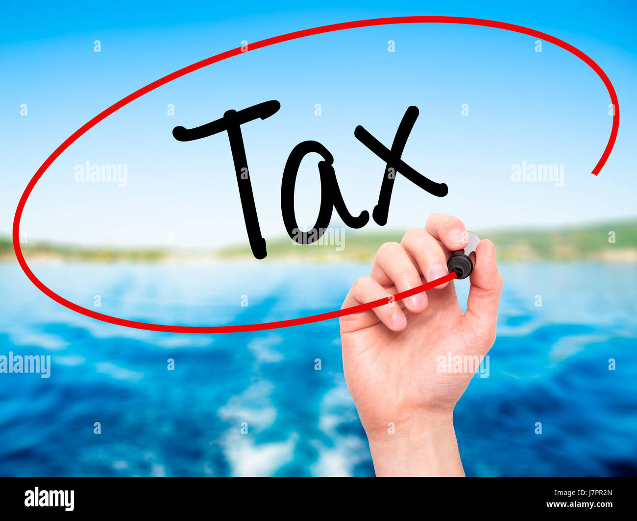 Man Hand writing Tax with black marker on visual screen. Isolated on ...